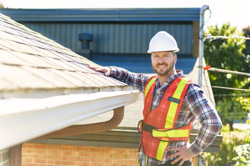 Man with Hard Hat Standing on Steps Inspecting House Roof Stock Image ...