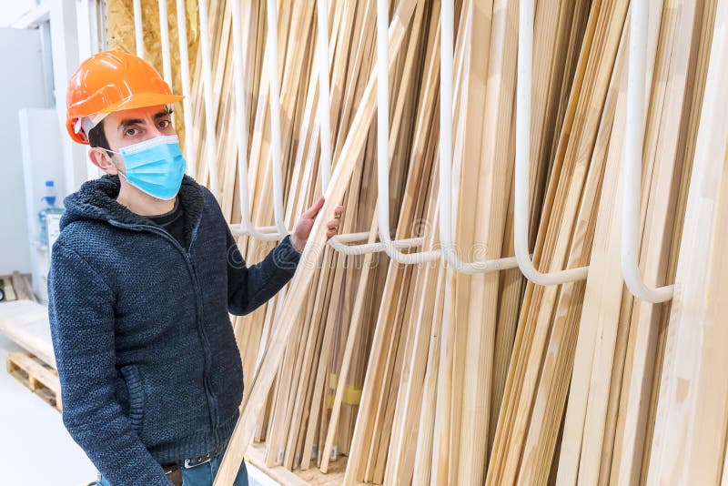 A Man in a Hardware Store. Sells Boards. Selective Focus Stock Image ...