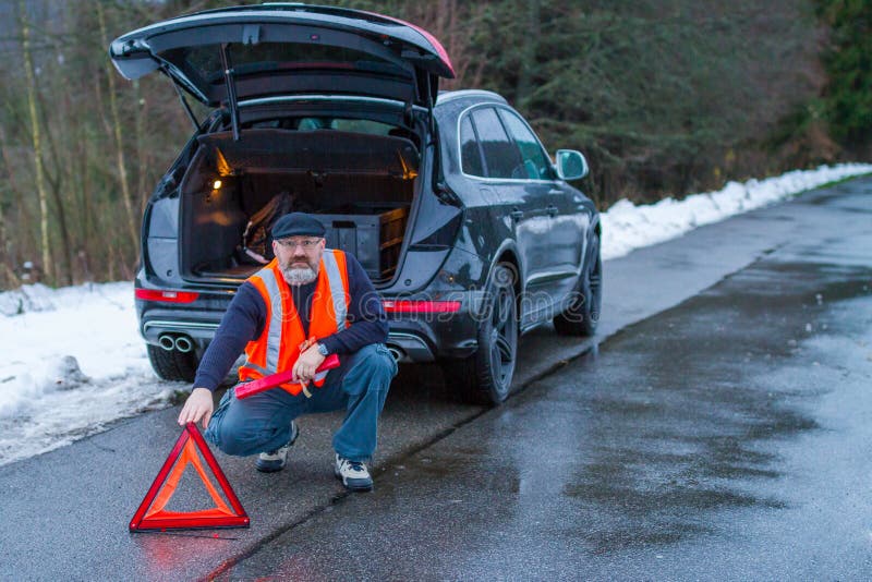 A Man Has a Car Breakdown on a Country Road Stock Photo - Image of ...