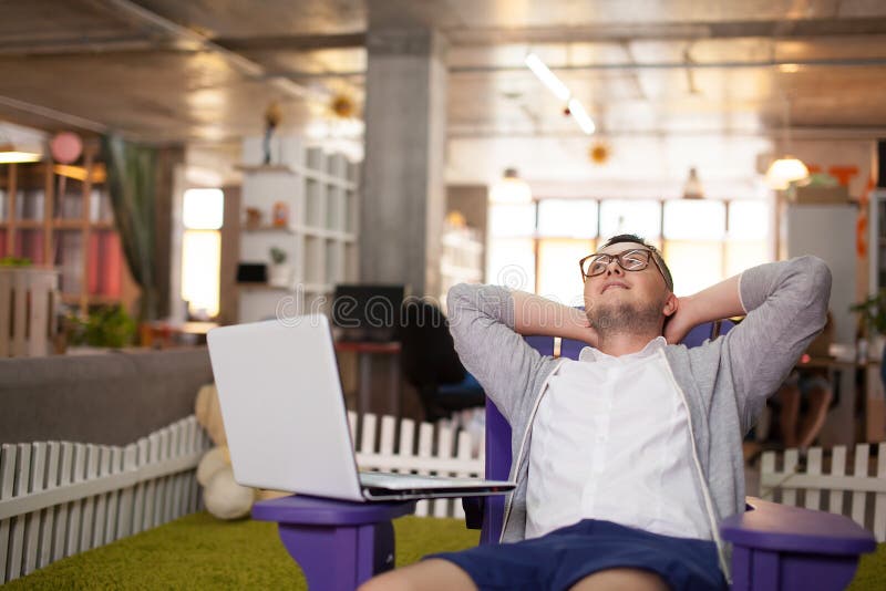 Man Have Rest in Startup Office Stock Photo - Image of fashion, indoors ...
