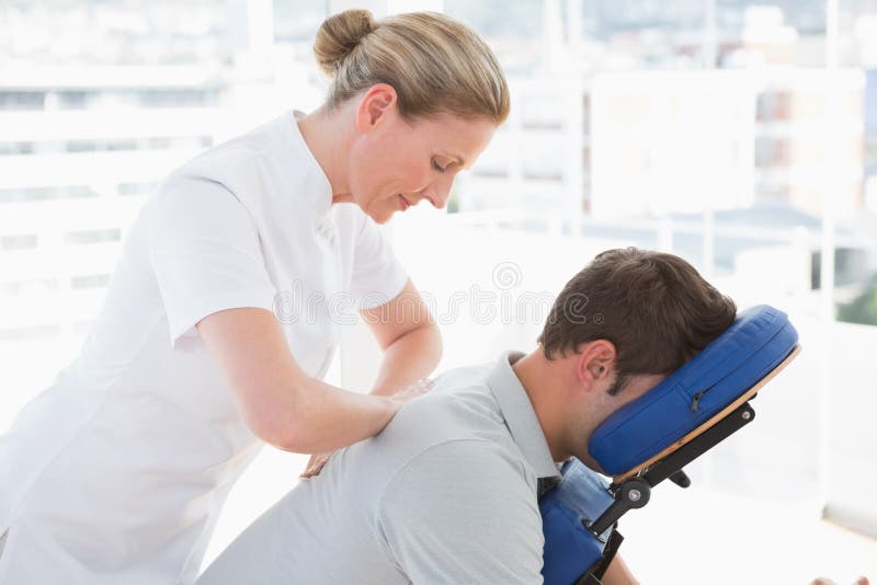 Man having back massage stock image. Image of people - 50490737