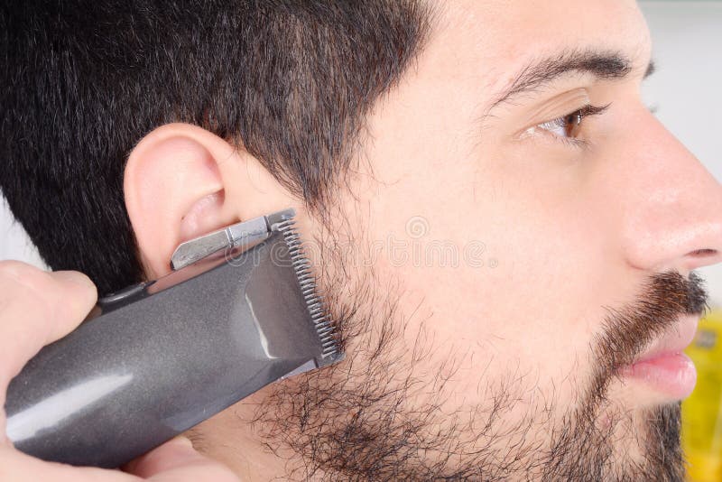 Man Having a Beard Cut with Hair Clippers. Stock Image - Image of ...