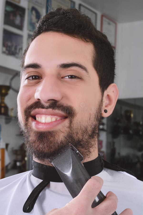 Man Having a Beard Cut with Hair Clippers. Stock Photo - Image of ...
