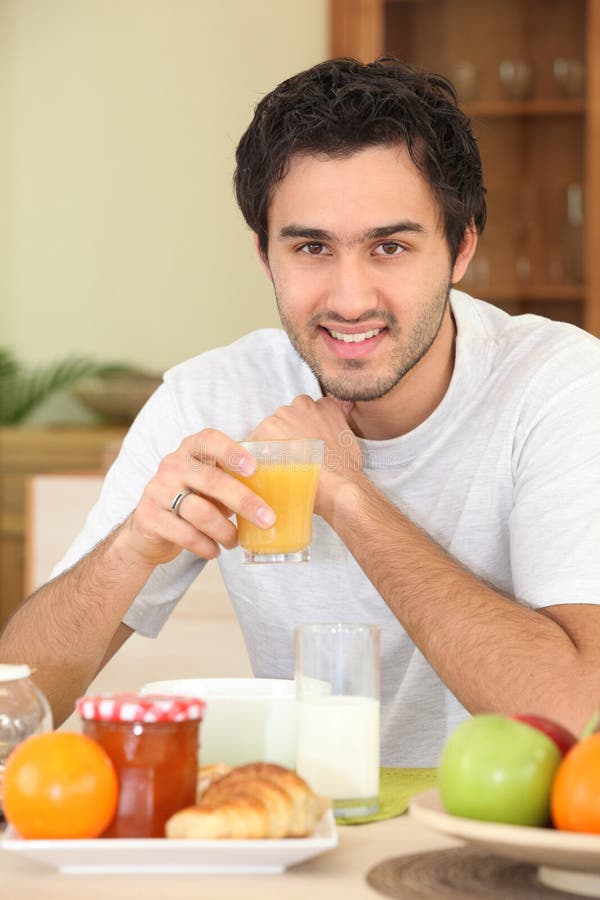 Man having breakfast stock photo. Image of nutrition - 27385492