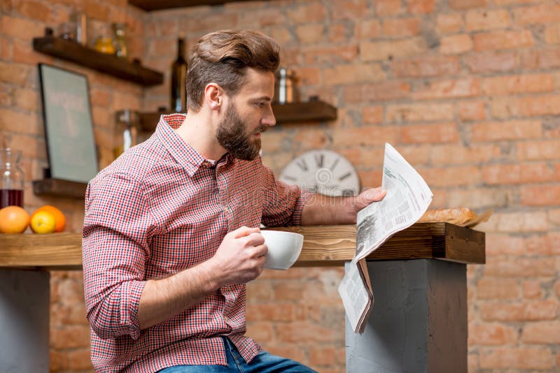 Man Having Breakfast at the Kitchen Stock Image - Image of loft, brick ...