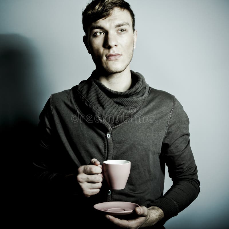 Man having a cup of coffee stock photo. Image of fashion - 23393754