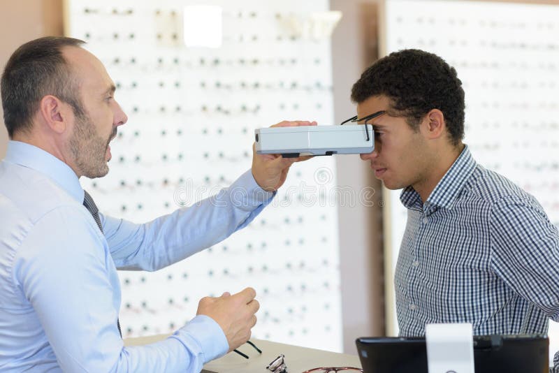 Man having eye test stock photo. Image of optical, optometry - 276721292