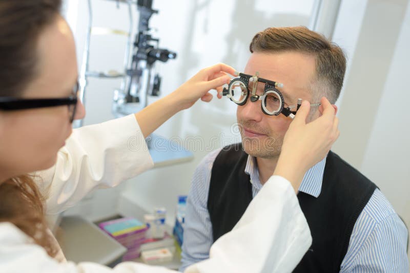 Man having eyes tested stock photo. Image of lens, examination - 102286244