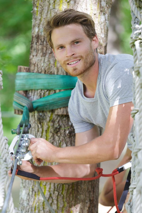 Man Having Fun on High Ropes Course Stock Image - Image of line, action ...