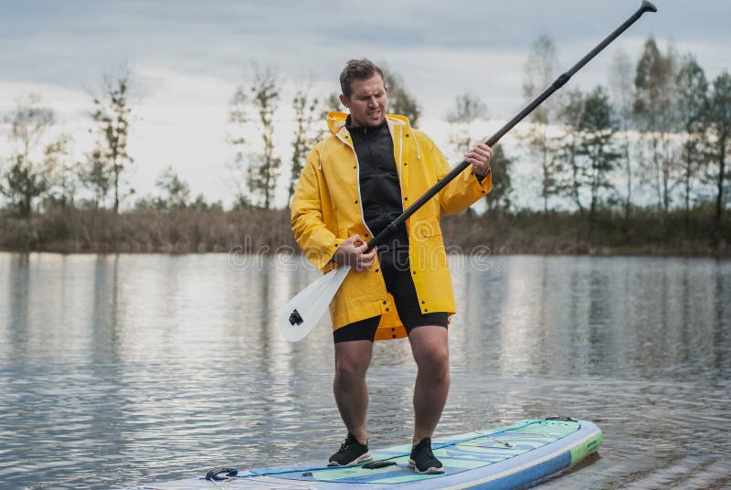 Inflatable Sup Board Stranded On A Beautiful Sea Pebble Beach Stock ...