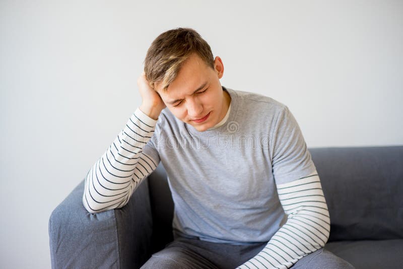 Man having a headache stock photo. Image of headache - 97469134