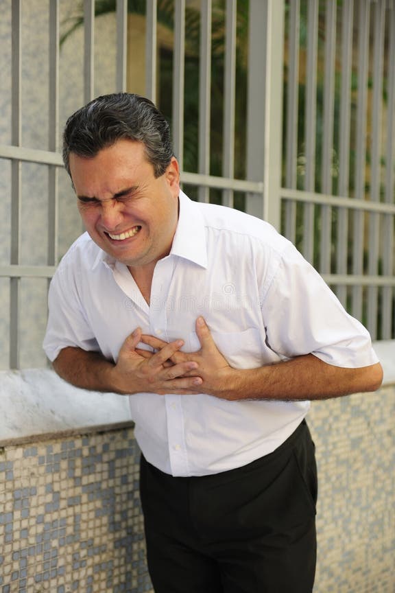 Man Having a Heart Attack Bending Stock Image - Image of middle, chest ...
