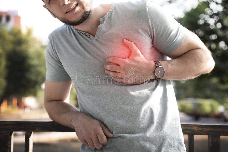 Man Having Heart Attack Outdoors, Closeup View Stock Photo - Image of ...