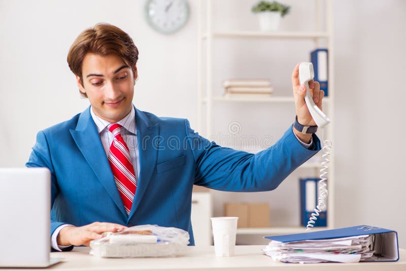 The Man Having Meal at Work during Break Stock Image - Image of laptop ...
