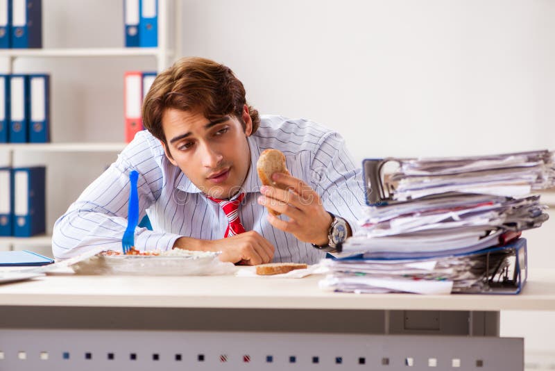 The Man Having Meal at Work during Break Stock Image - Image of eating ...