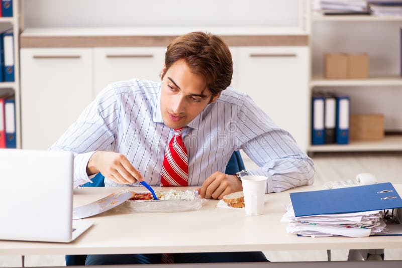 The Man Having Meal at Work during Break Stock Photo - Image of desk ...
