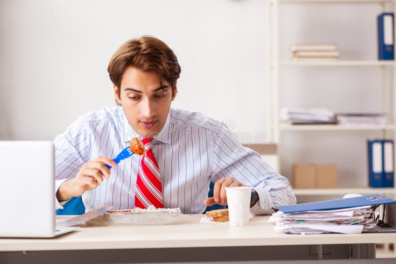 The Man Having Meal at Work during Break Stock Photo - Image of ...