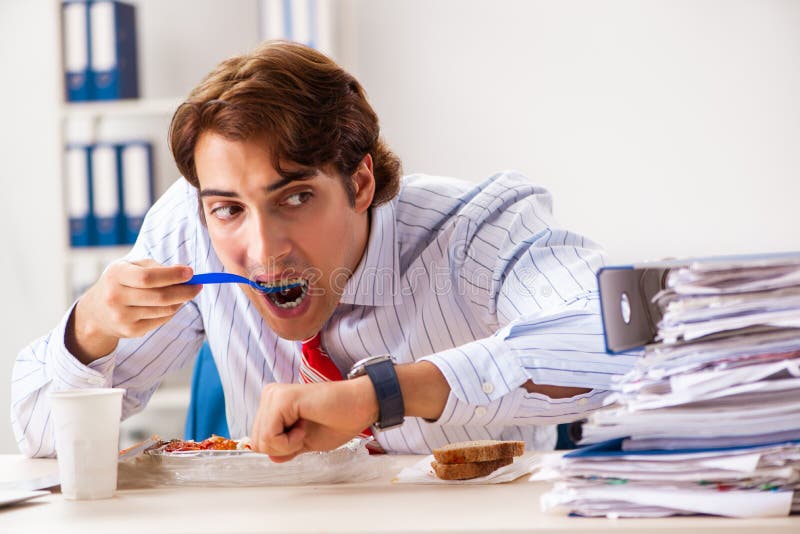 The Man Having Meal at Work during Break Stock Image - Image of ...