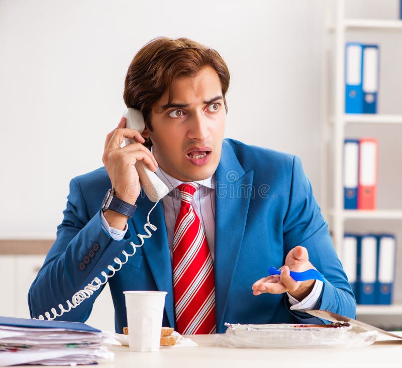 The Man Having Meal at Work during Break Stock Photo - Image of ...