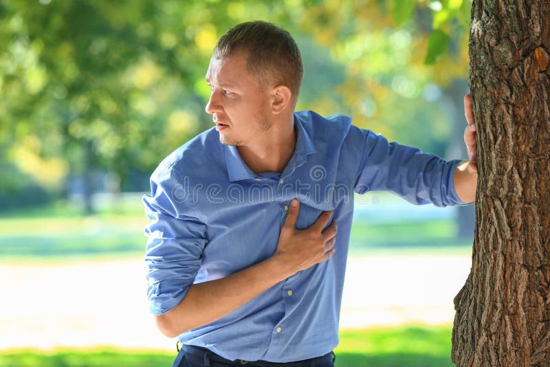 Man Having Panic Attack Outdoors Stock Photo - Image of chest, fear ...