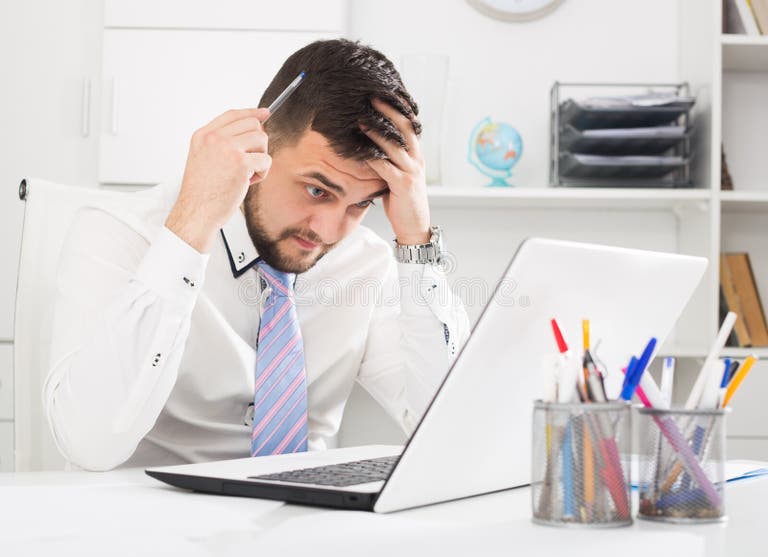 Man Having Problem in Office Stock Photo - Image of intelligent, male ...