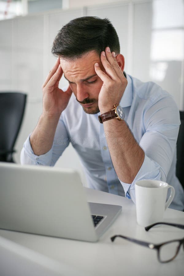 .Man Having Problem in the Work. Business Man Sitting in Stock Photo ...