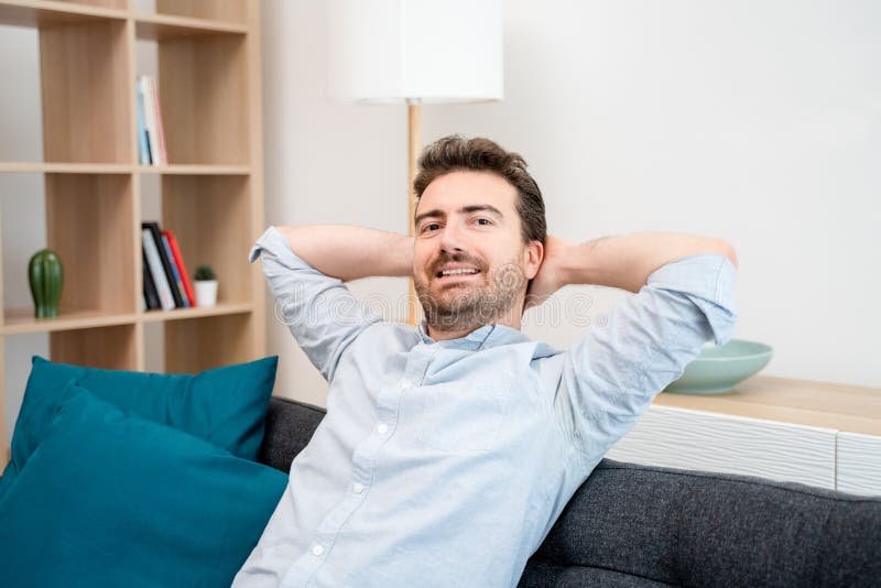 Man Having a Restful Moment Relaxing in Sofa Stock Photo - Image of ...