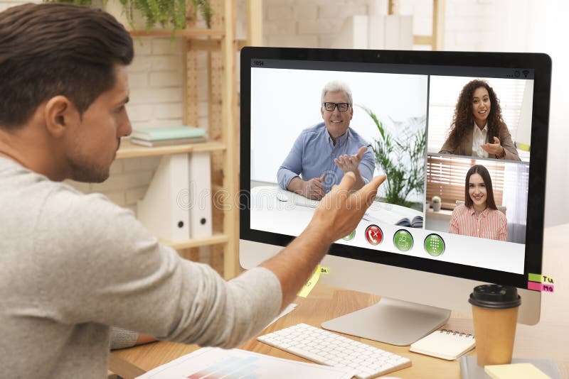 Man Having Video Chat with Colleagues at Table. Team Work Stock Photo ...