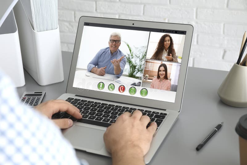 Man Having Video Chat with Colleagues at Table in Office. Team Work ...