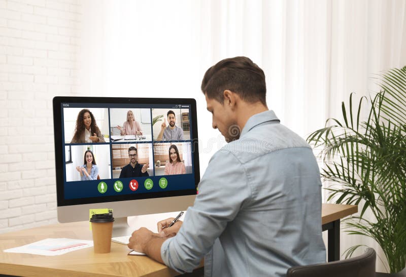Man Having Video Chat with Colleagues at Table in Office. Team Work ...