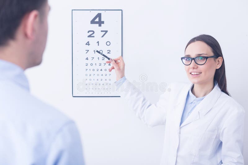 Man having vision test stock photo. Image of customer - 88477846