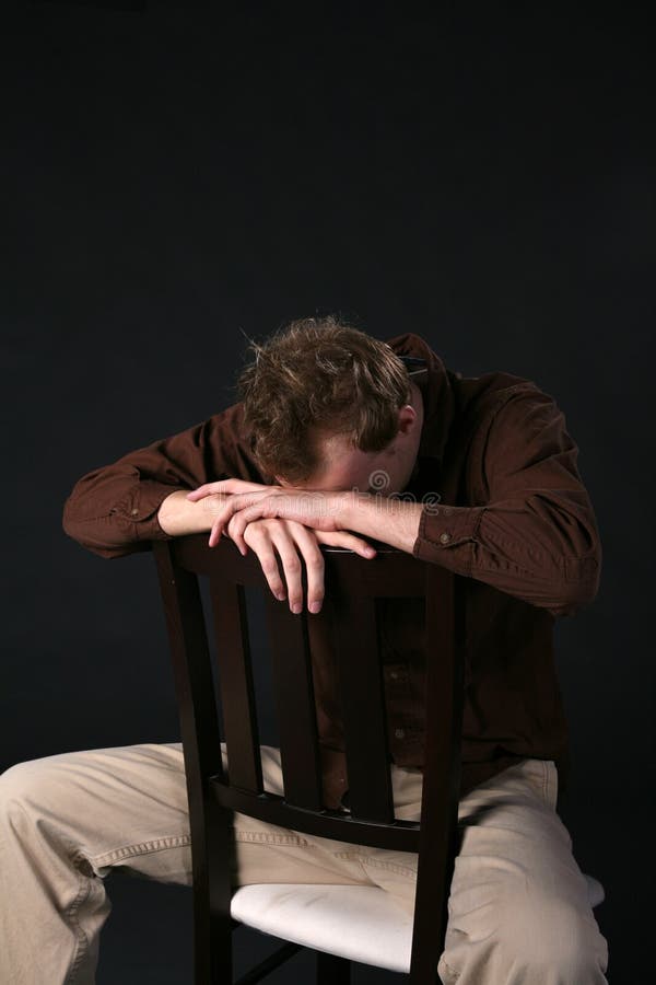 Man with head down stock photo. Image of hide, hair, chair - 6246374