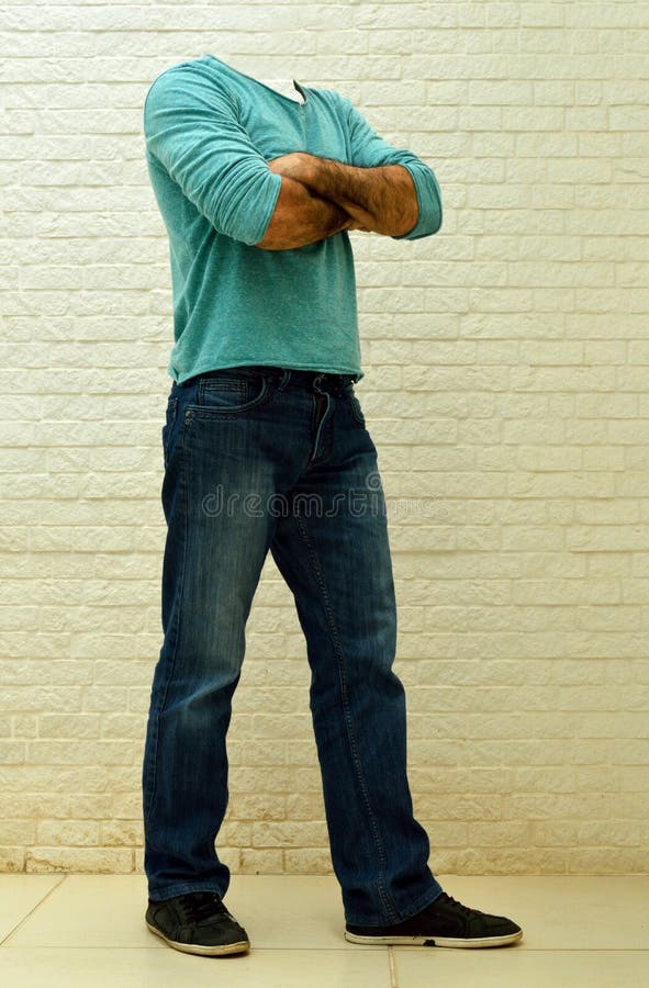 Man without Head in Front of a White Wall Stock Photo - Image of shirt ...