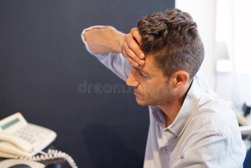 Man with a Headache in Front of the Computer Stock Photo - Image of ...