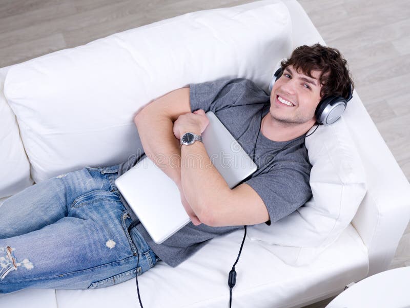Man with Laptop and Headphone Stock Image - Image of leisure, computer ...