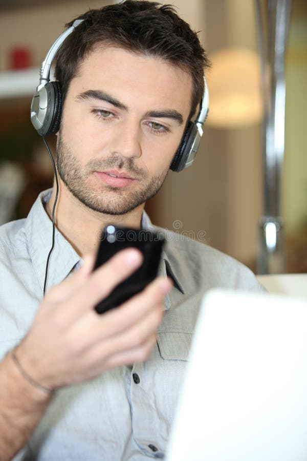 Man with headphones stock photo. Image of read, connected - 23492494