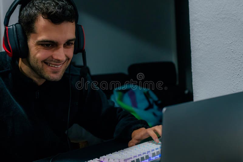 Man with Headphones and Computer at Home Stock Image - Image of ...