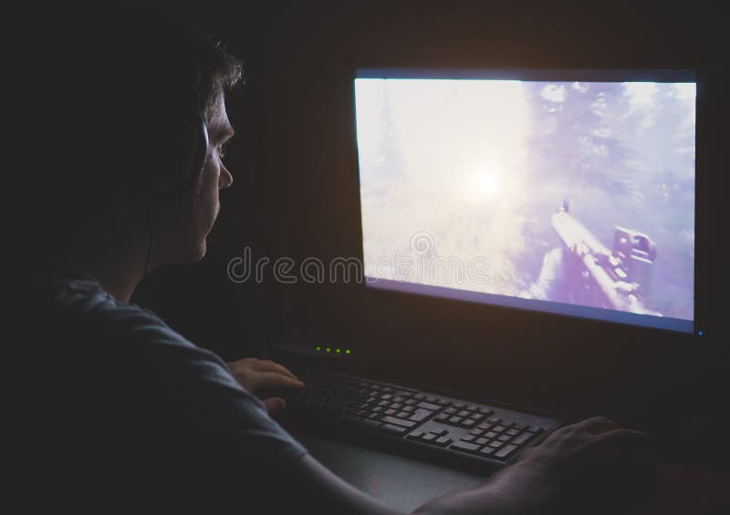 Man playing computer game. stock photo. Image of back - 114281548