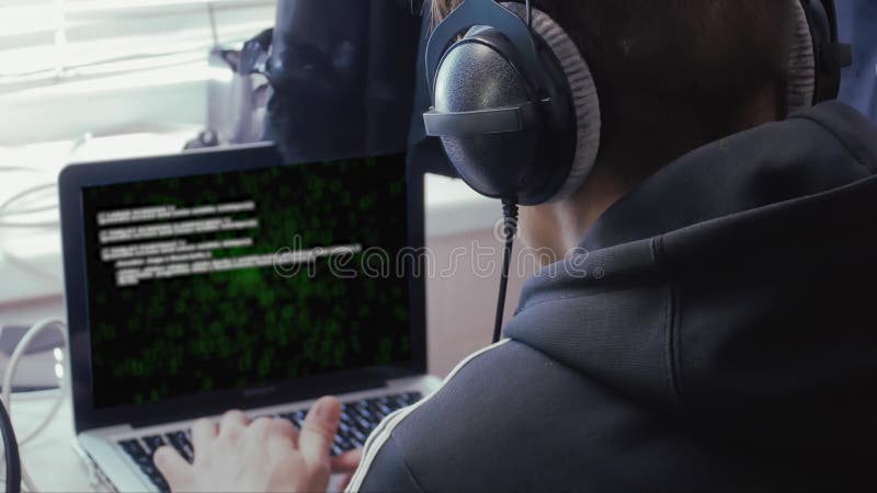 Hacker in Headphones Using Computer at Nigt Stock Footage - Video of ...