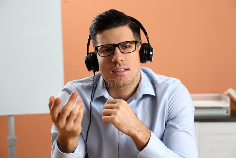 Man with Headset Holding Online Webinar Indoors, View from Webcam Stock ...