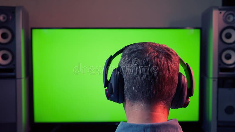 Man with Headset Interacting with a Large Computer Screen Stock Footage ...