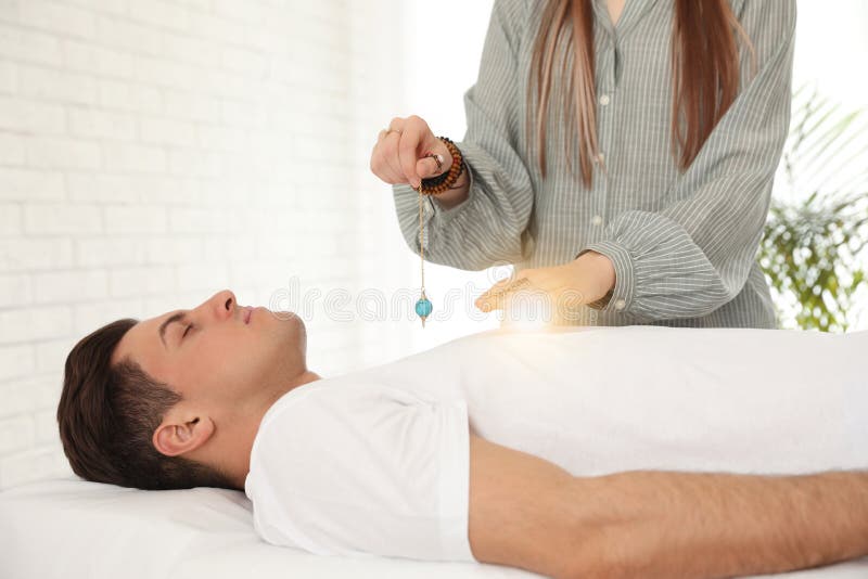 Man during Healing Session in Room Stock Image - Image of crystal, hand ...