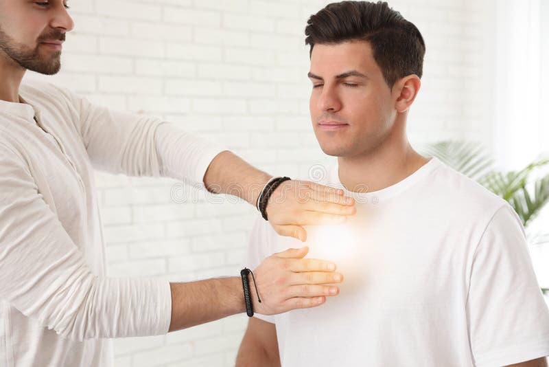 Man during Healing Session in Room Stock Photo - Image of expert, aura ...