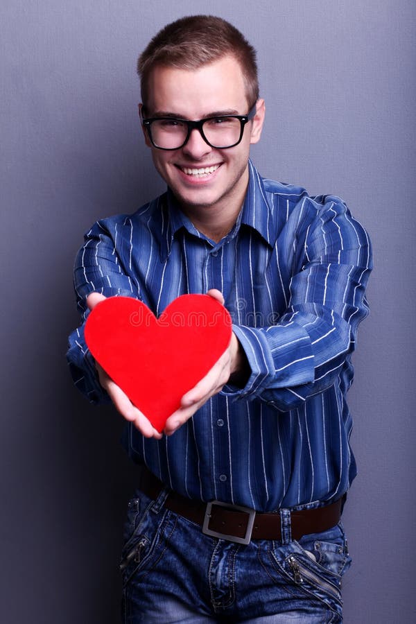 Man with heart stock image. Image of heart, male, jeans - 28188385