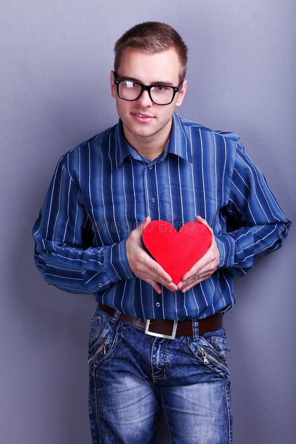 Man with heart stock image. Image of heart, male, jeans - 28188385