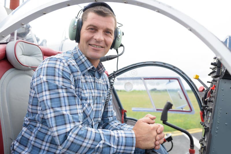 Older Man in Helicopter, Wearing Headset Stock Image - Image of journey ...