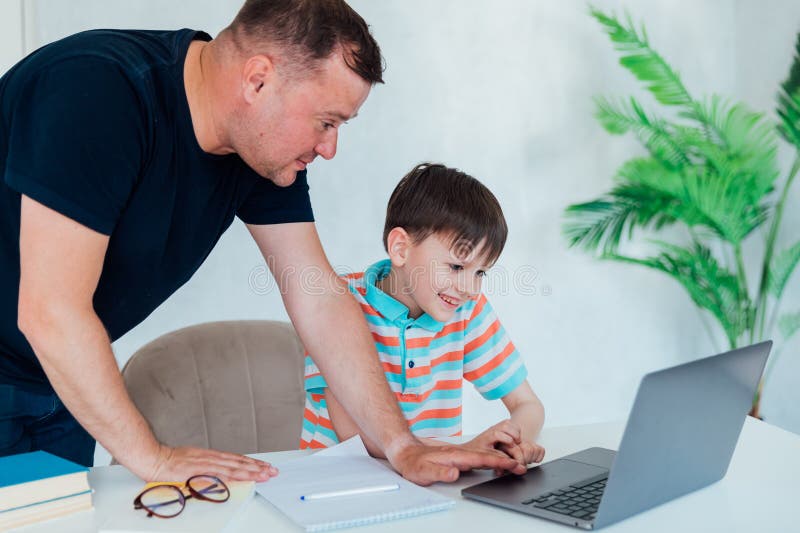 Man Helping Child Studying at Computer Stock Image - Image of homework ...