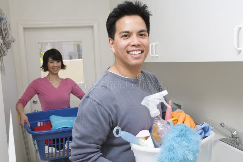 Man Helping Woman at Household Work Stock Image - Image of equipments ...