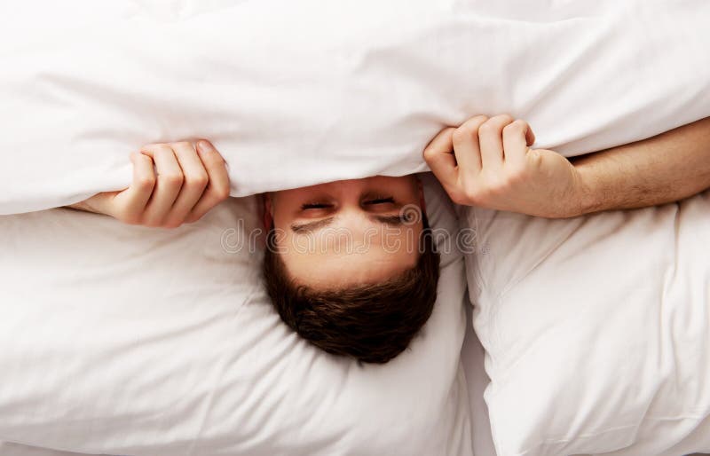Man Hiding in Bed Under Sheets. Stock Image - Image of adult, lying ...