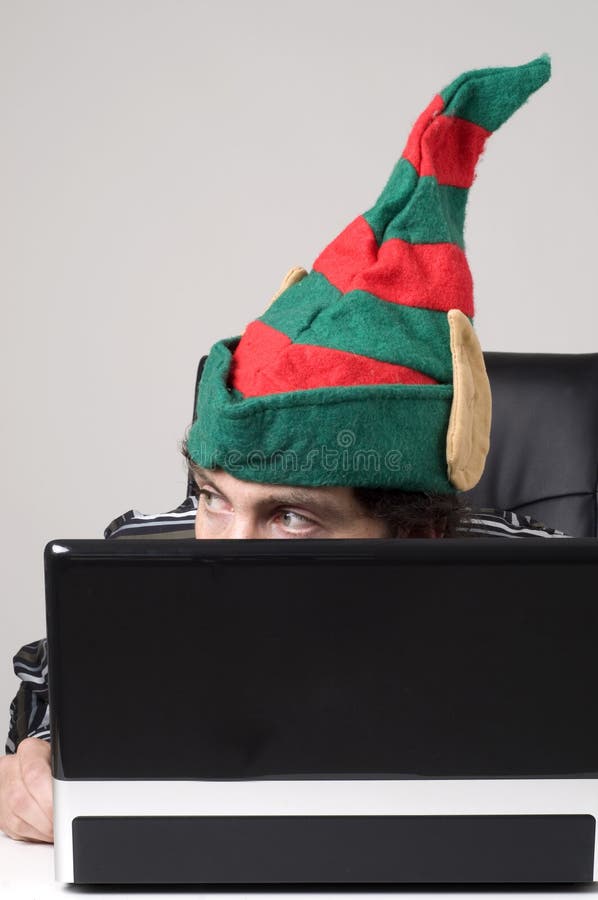 Man hiding behind laptop stock photo. Image of adult - 11429608